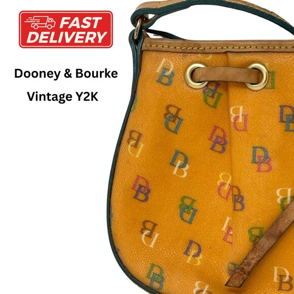 Dooney & Bourke | Bags | Dooney Bourke Yellow Db Logo Mini Purse ...